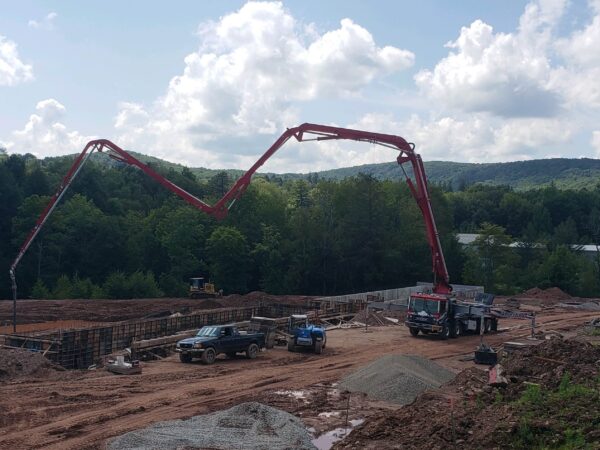 Boom Pumps - Precision Concrete Pumping, Inc.